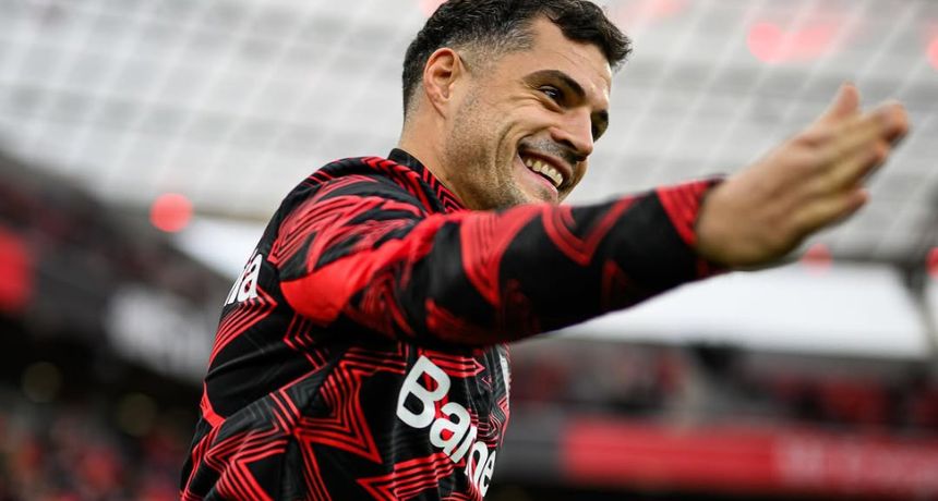 Bayer star Granit Xhaka showcases new haircut during family vacation in ...