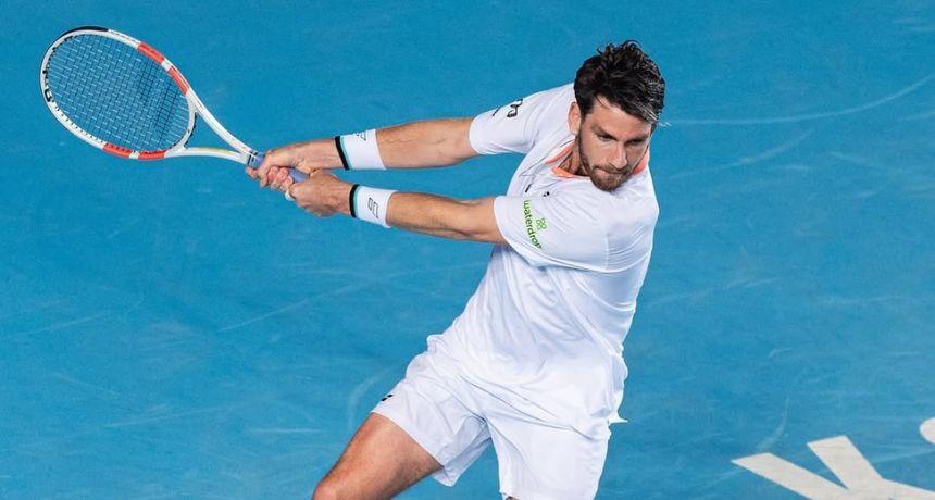Emotions run high! Tennis star Cam Norrie throws racket into the stands ...