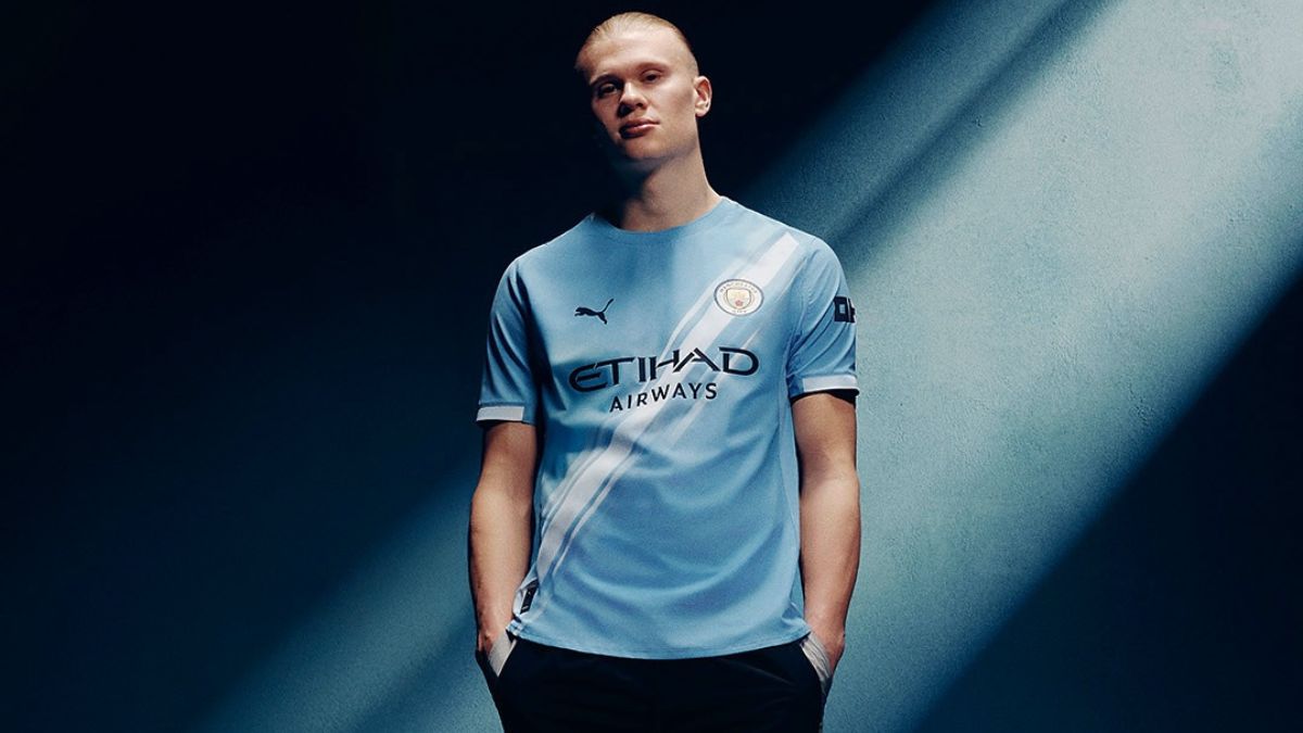 In a revamped style. Erling Haaland poses in Manchester City's new kit ...