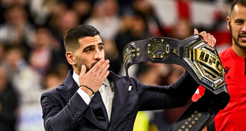 The new UFC champion showed off his belt at his favourite football club ...