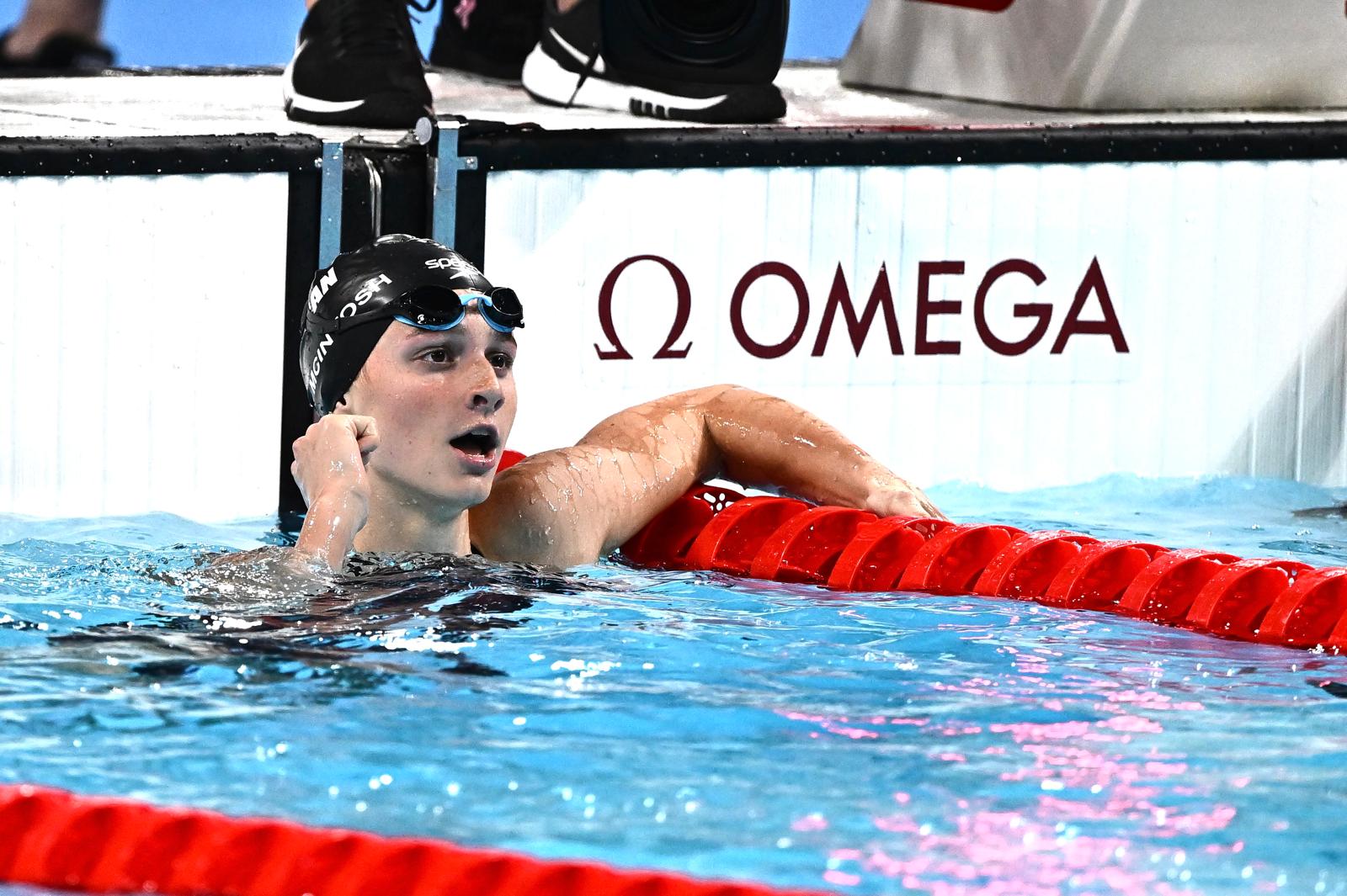 A 17-year-old Canadian set an Olympic record in the 200-meter butterfly ...