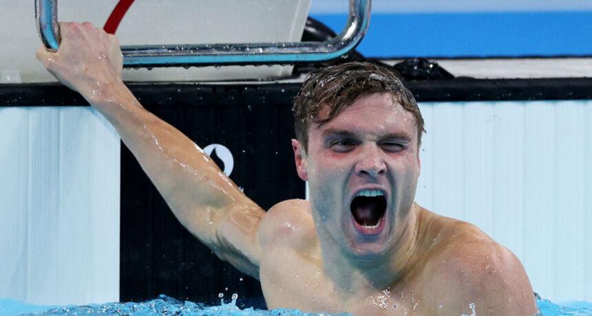 There's a world record. American swimmer Finke wins his third Olympic ...